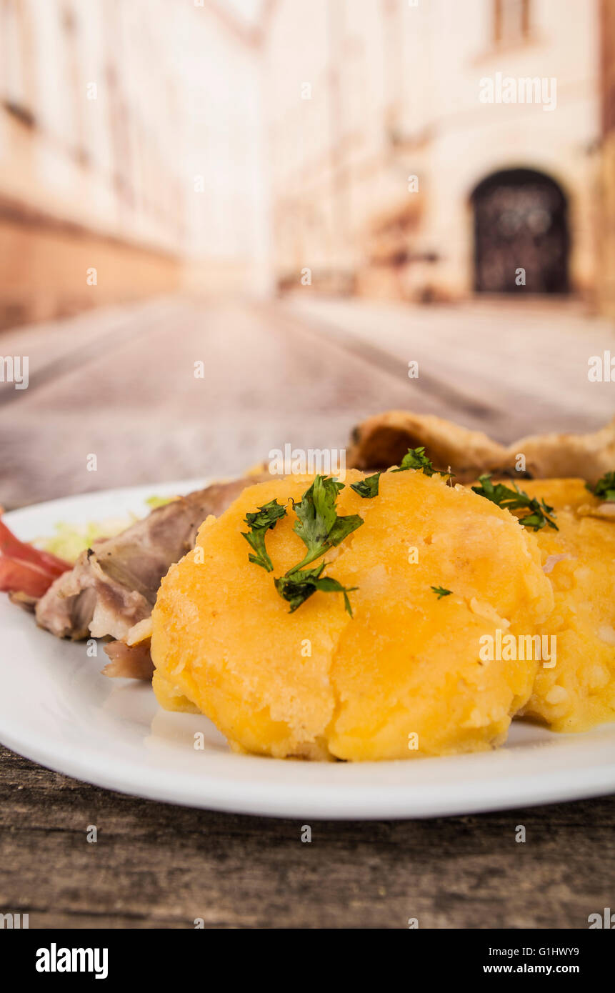 Traditional ecuadorian pork fritada typical serving, meat, potato ...