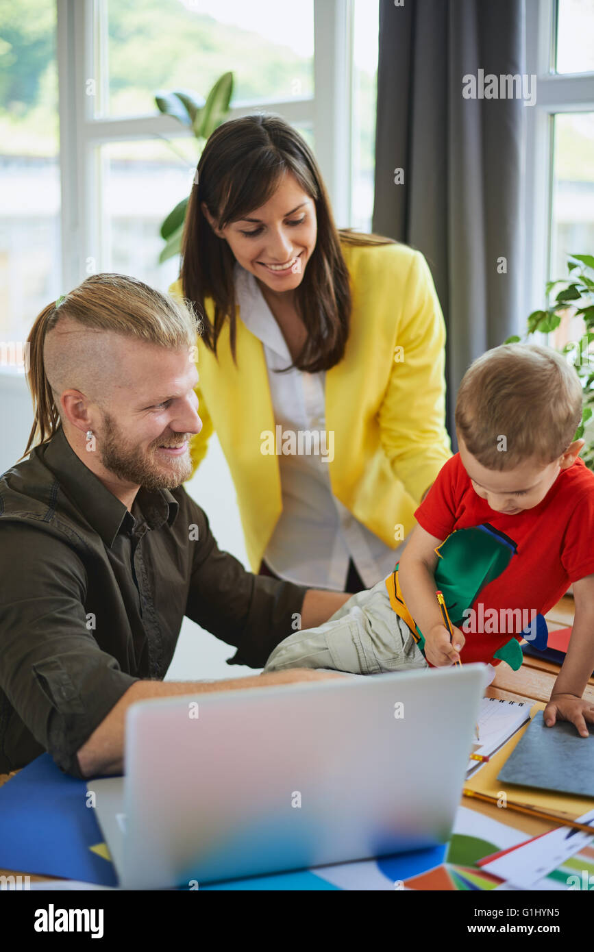 Family business start up concept, man working in home office, mother ...