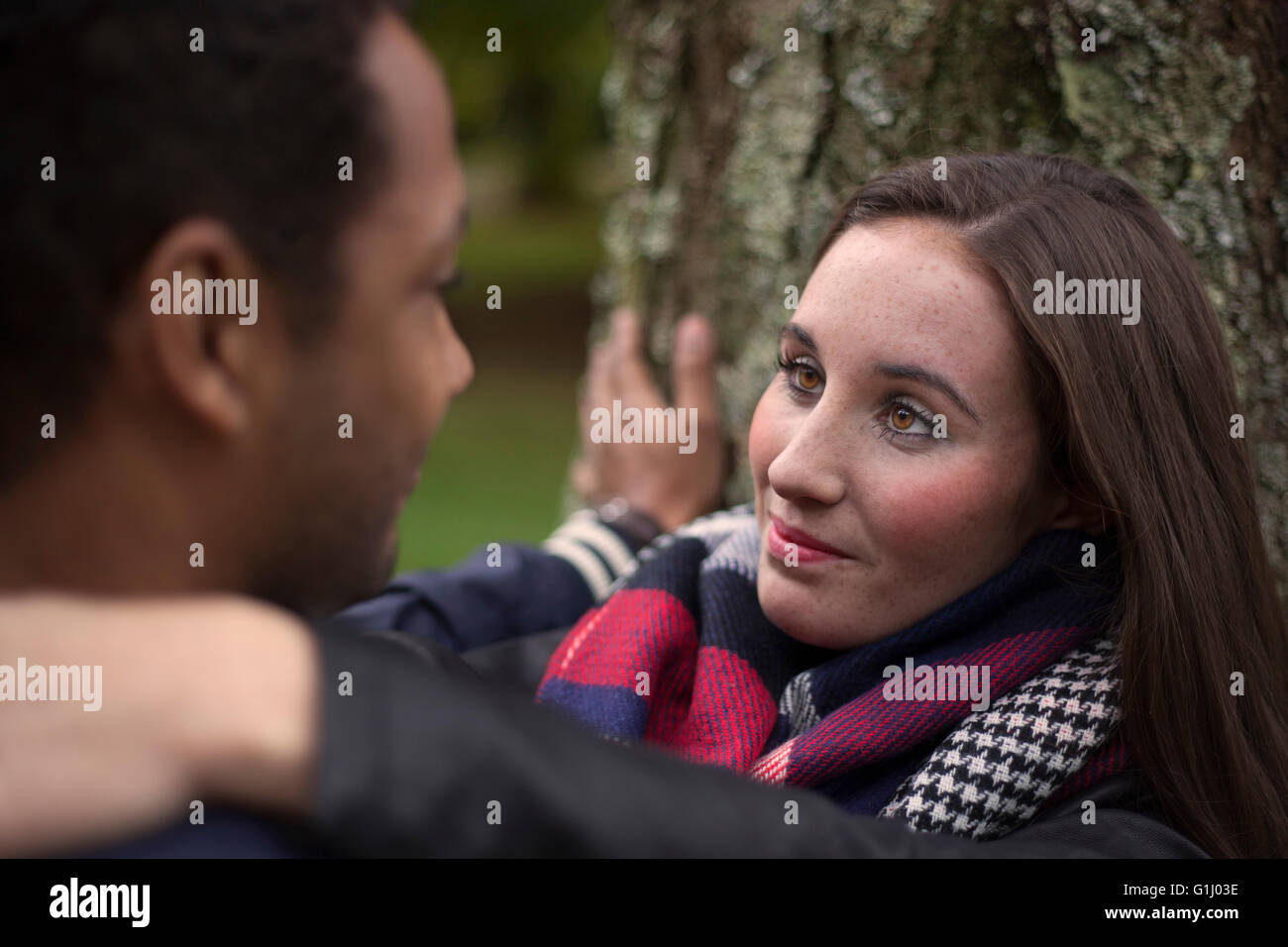 Interracial couple reading together hi-res stock photography and images ...