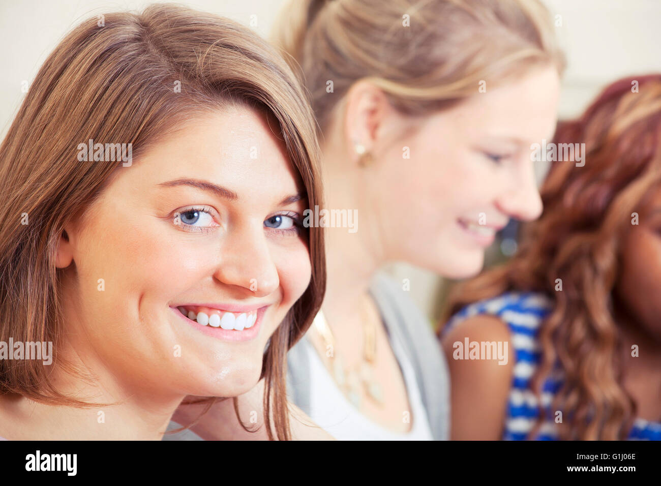 Happy friends spending time together Stock Photo - Alamy
