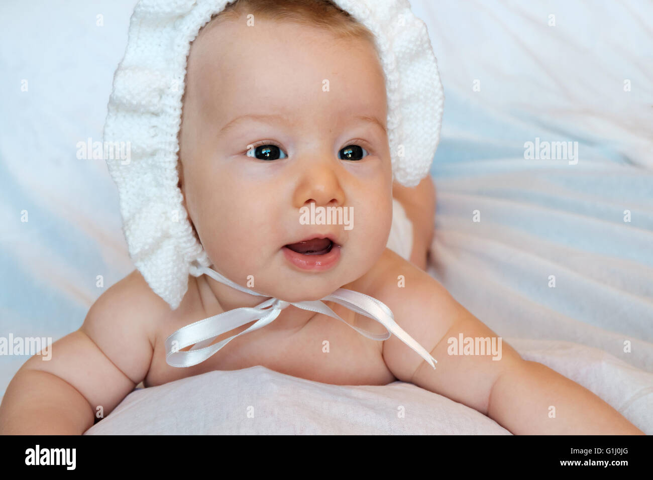 innocent baby on a white background Stock Photo - Alamy