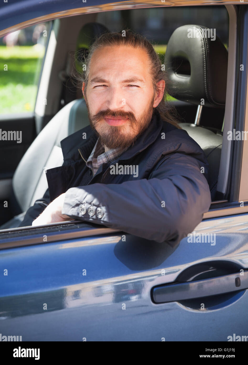 Asian male driving car hi-res stock photography and images - Alamy