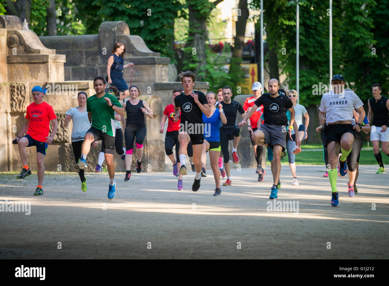 Group People Running Through Park High Resolution Stock Photography and ...