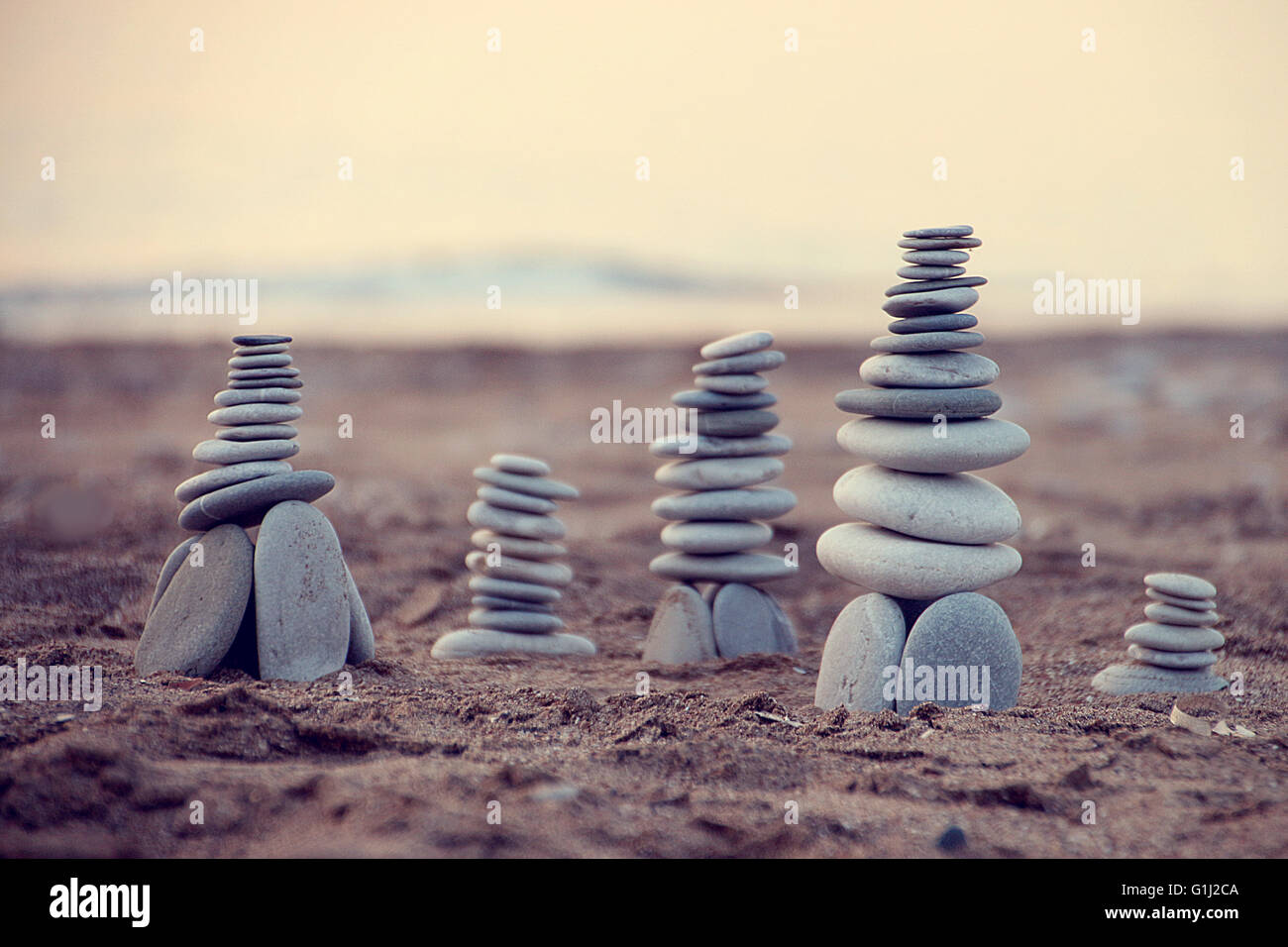 Stacks of pebbles on a beach Stock Photo - Alamy