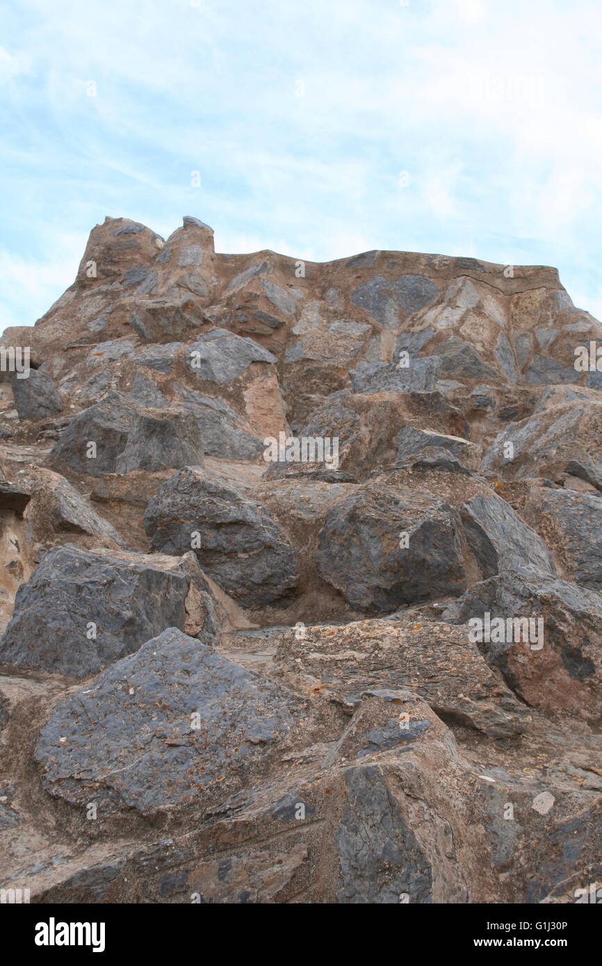 Rocks at an old battery, Spain Stock Photo - Alamy
