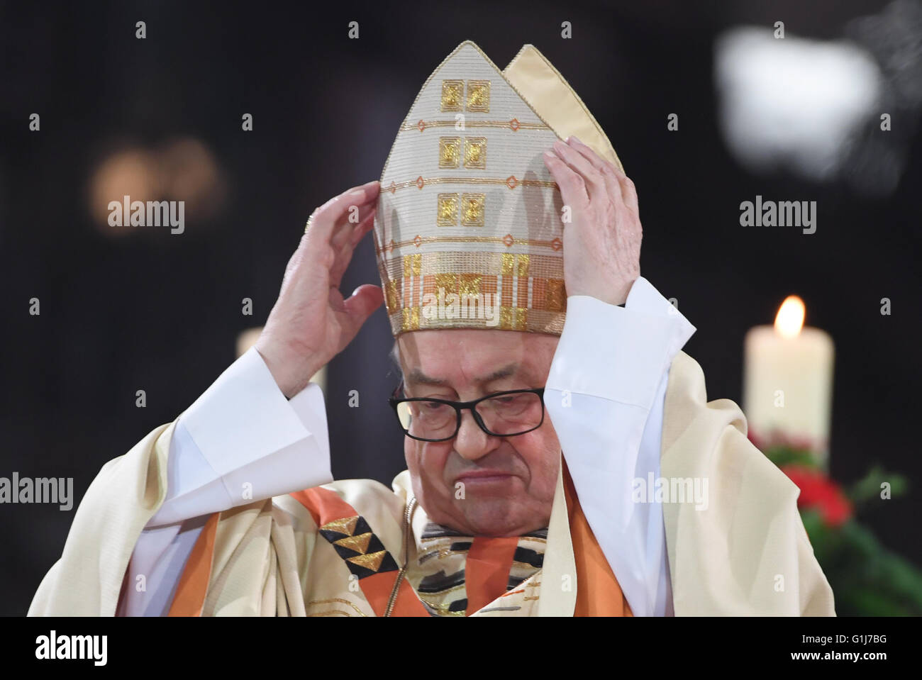 The parting Bishop of Mainz, Cardinal Karl Lehmann, puts on his ...
