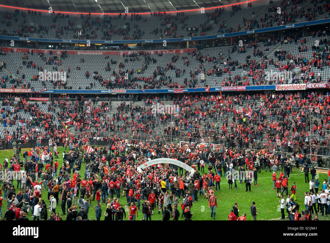 Munich, Germany. 14th May, 2016. Munich's fans storming the field after ...