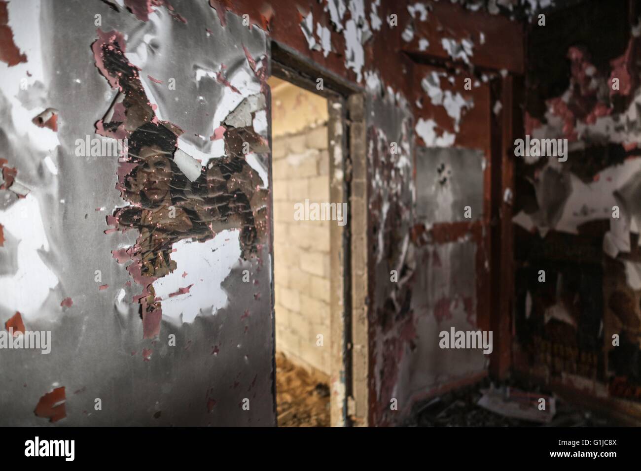 Gaza, Gaza City. 16th May, 2016. Faded movie posters are seen on the ...
