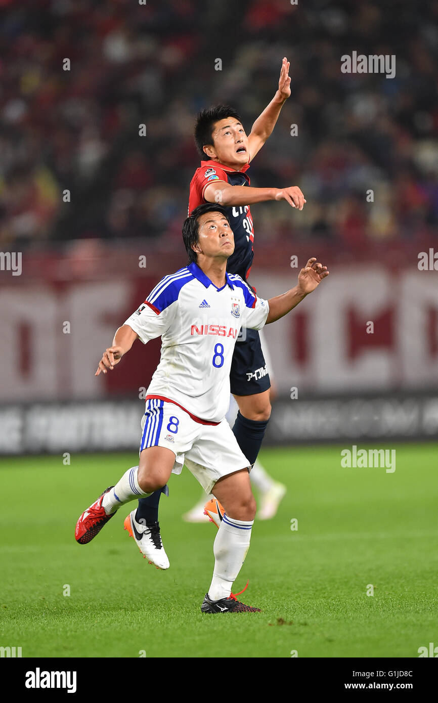Ibaraki, Japan. 14th May, 2016. (T-B) Yuma Suzuki (Antlers), Kosuke ...