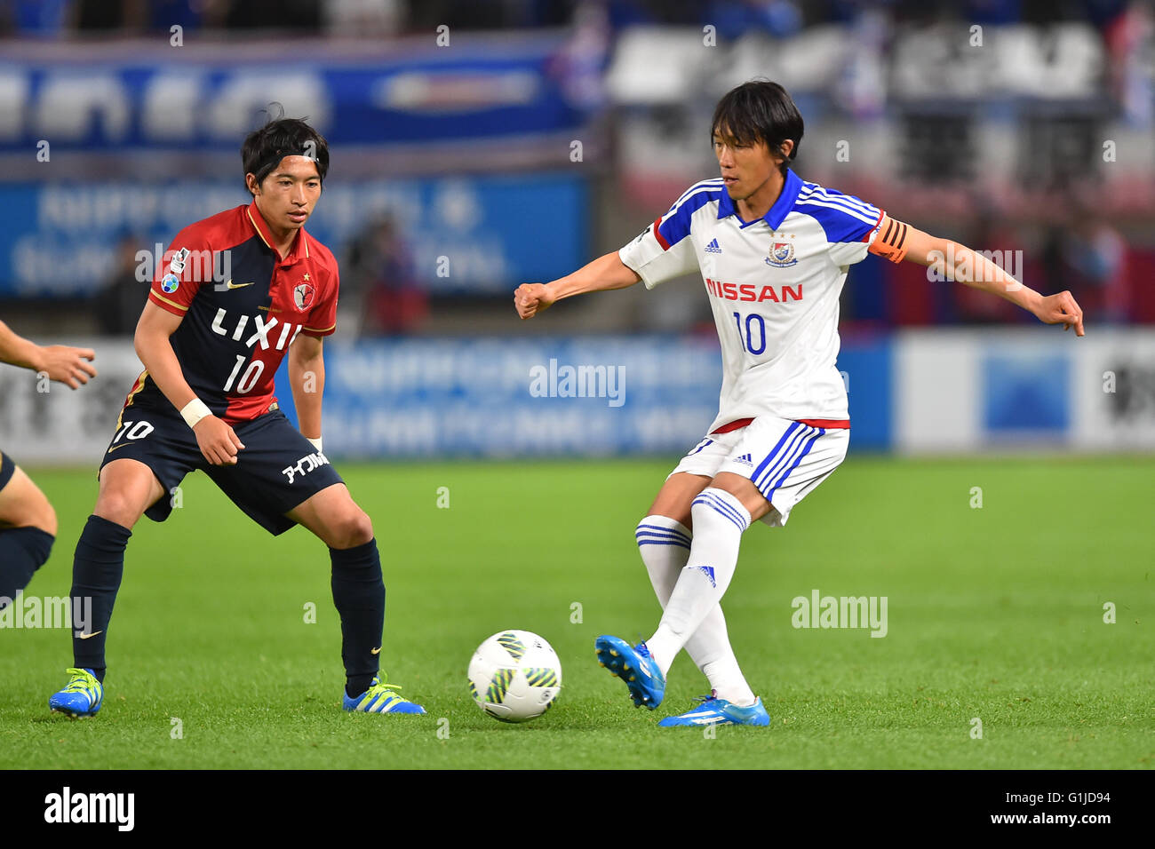 Ibaraki, Japan. 14th May, 2016. Gaku Shibasaki (Antlers), Shunsuke Nakamura (F Marinos) Football ...