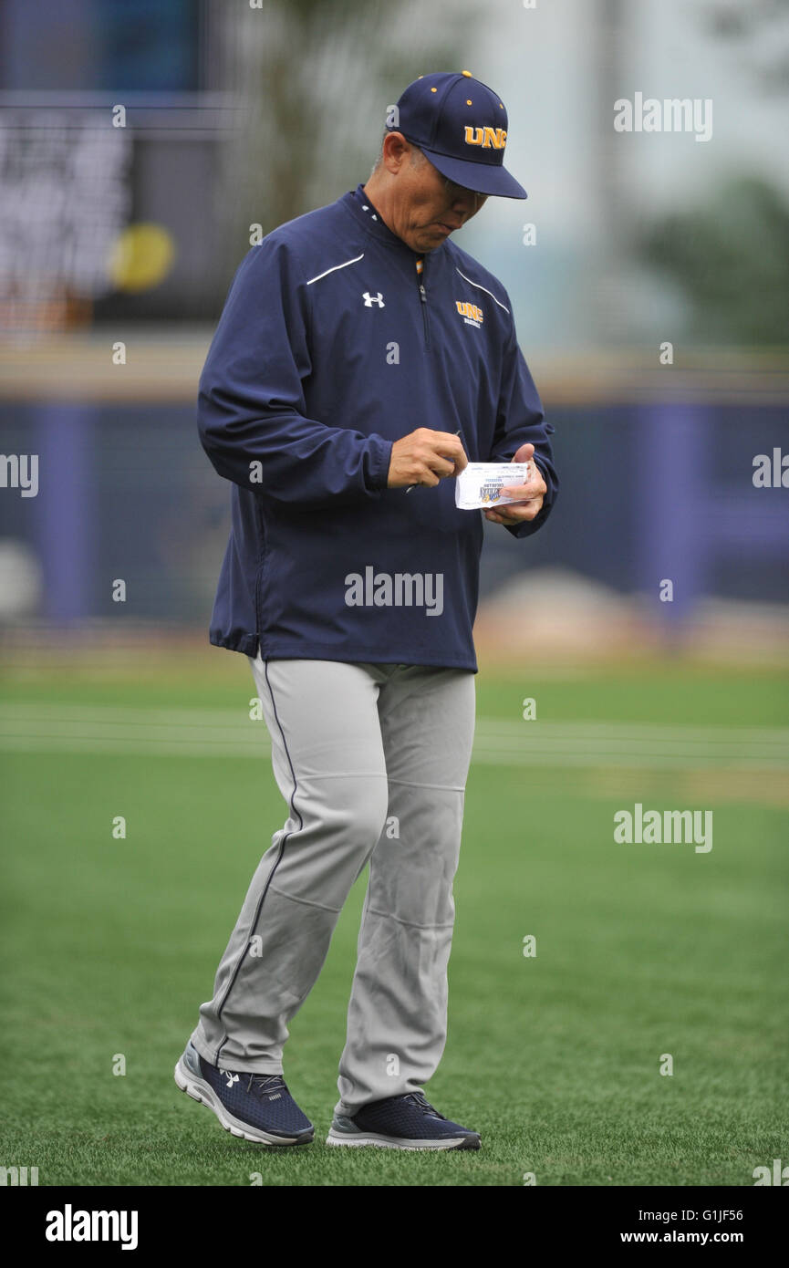 Northern Colorado Head Coach Carl Iwasaki checks his lineup card during ...
