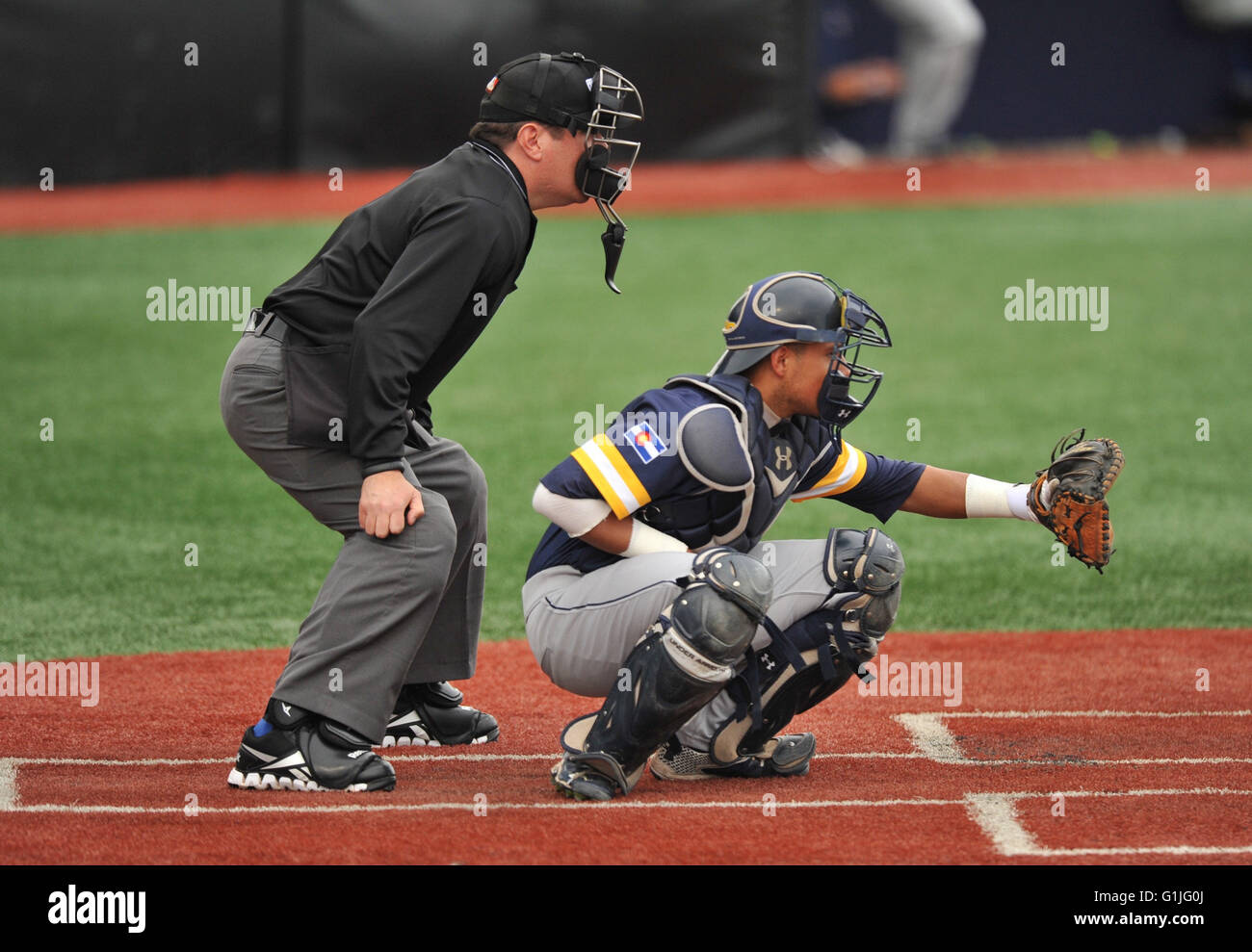 Northern Colorado catcher Jake Garcia (12) and home plate Umpire Brian ...