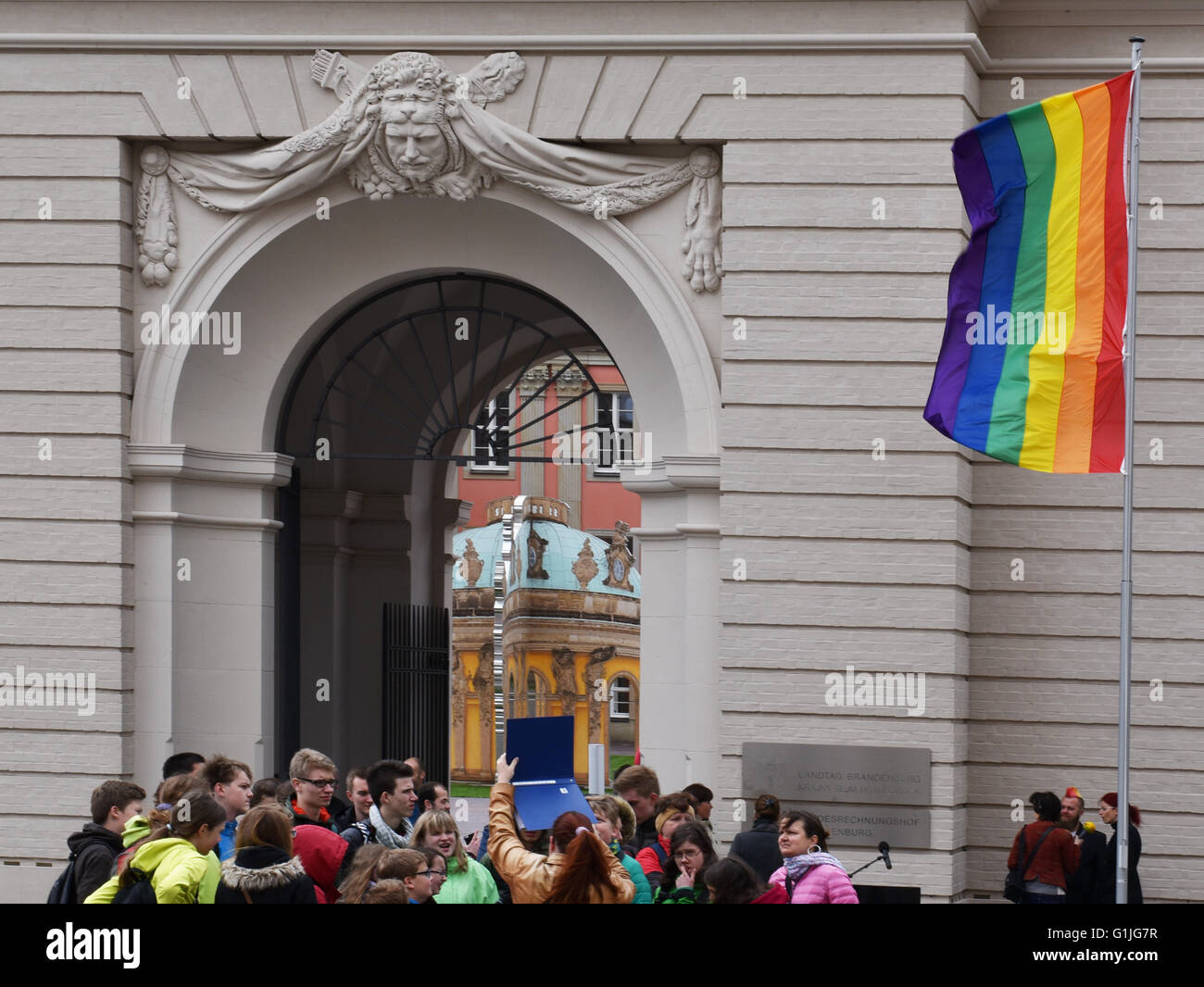 Potsdam, Germany. 17th May, 2016. A rainbow flag flies in front of the ...