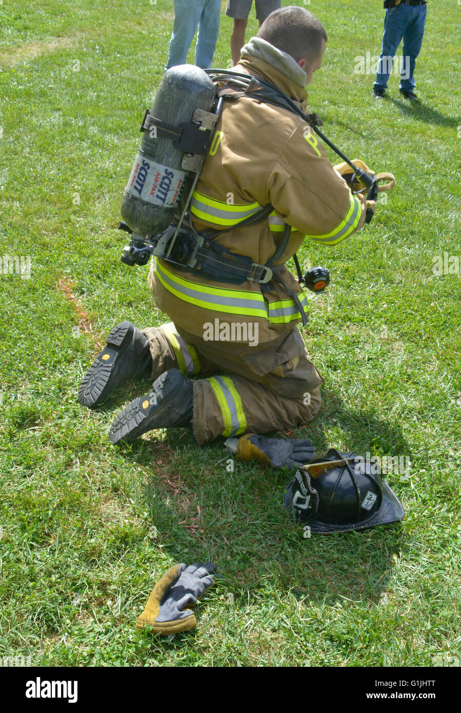 firefighter takes a break after a grueling drill Stock Photo - Alamy