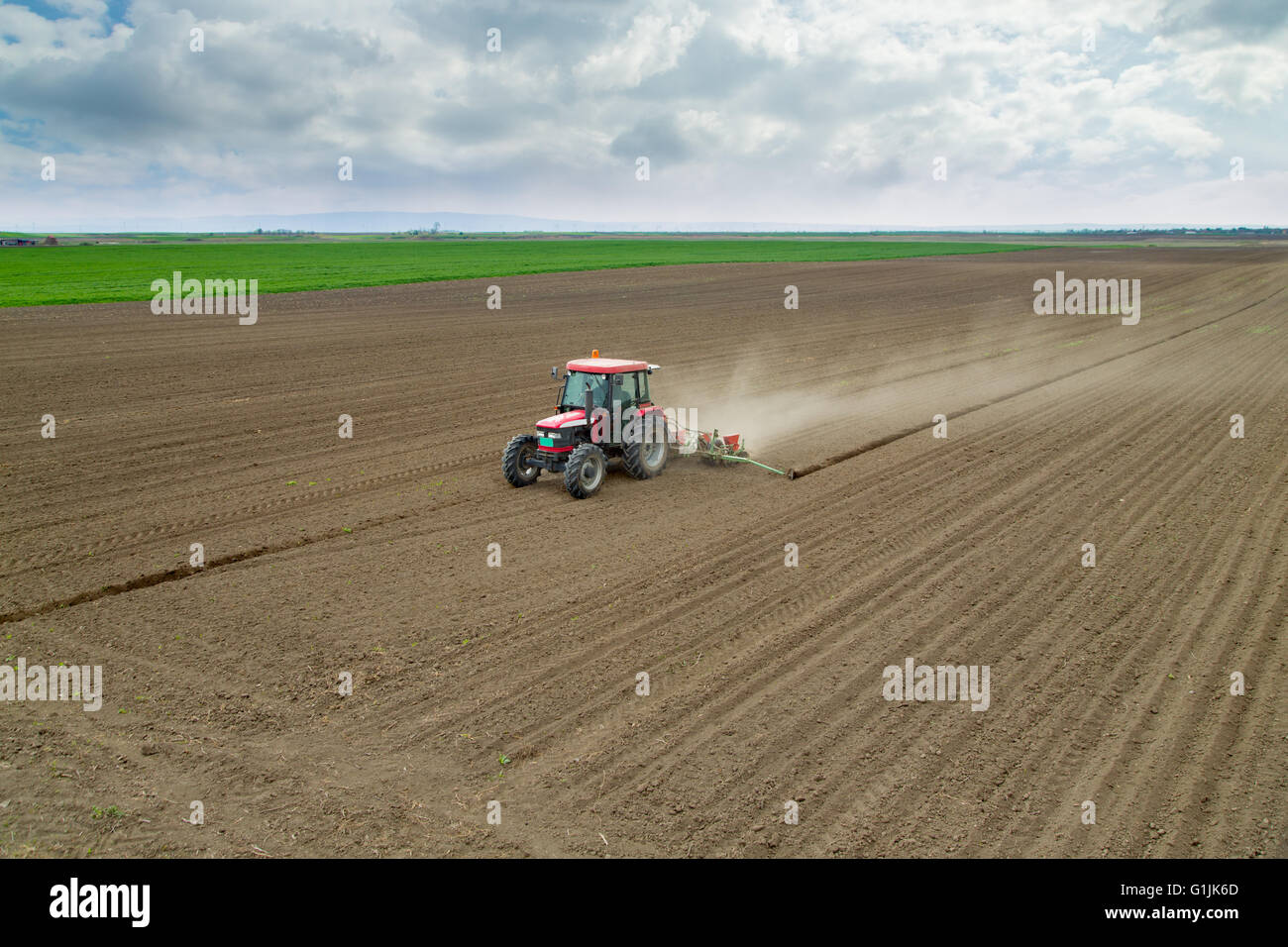 Sowing maize hi-res stock photography and images - Alamy