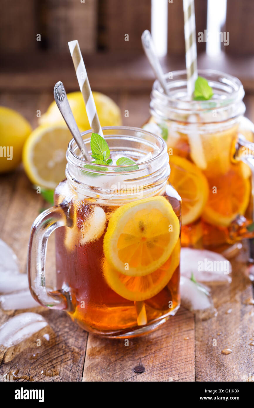 Iced tea with lemon slices Stock Photo - Alamy