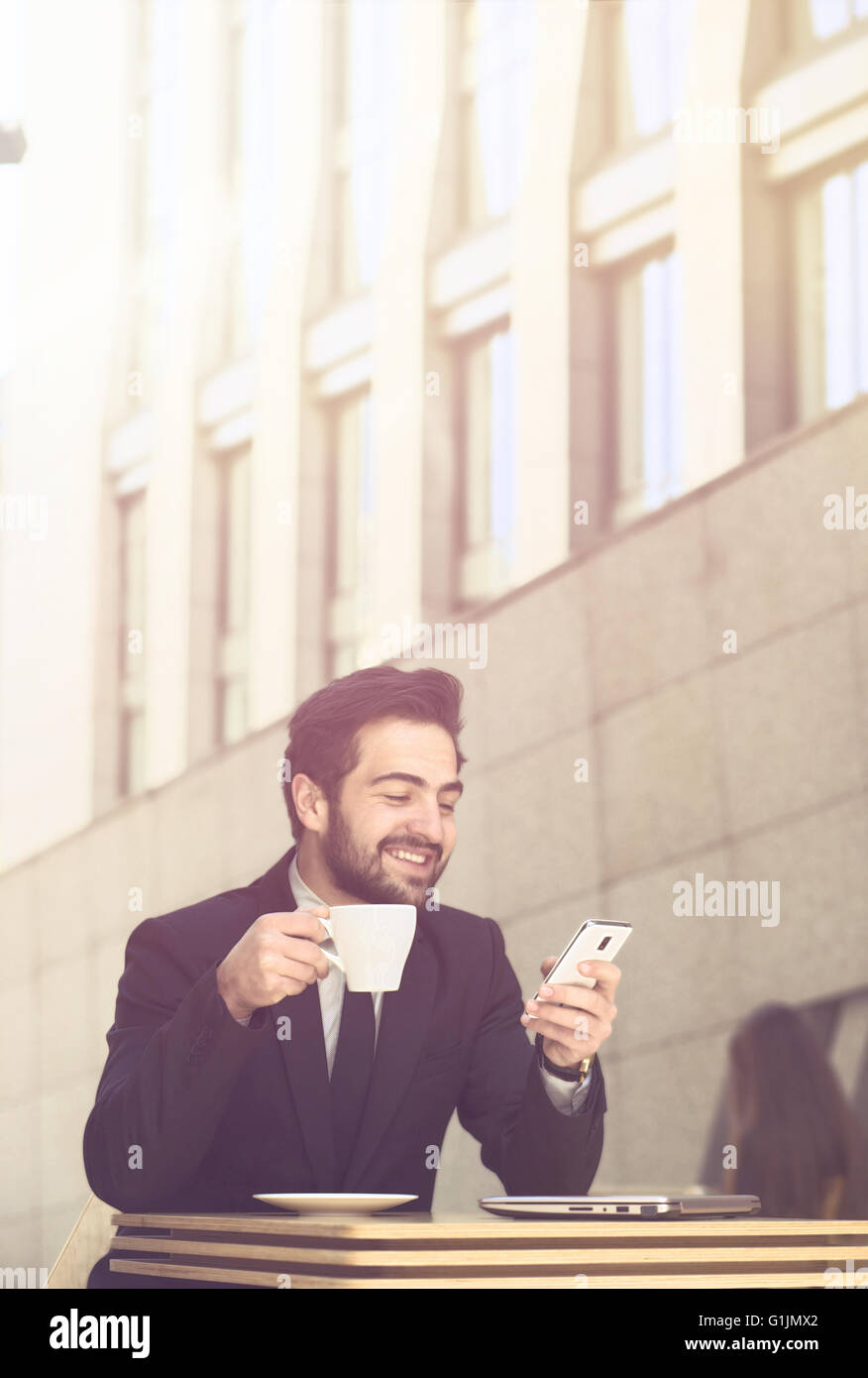 Businessman using mobile phone Stock Photo - Alamy