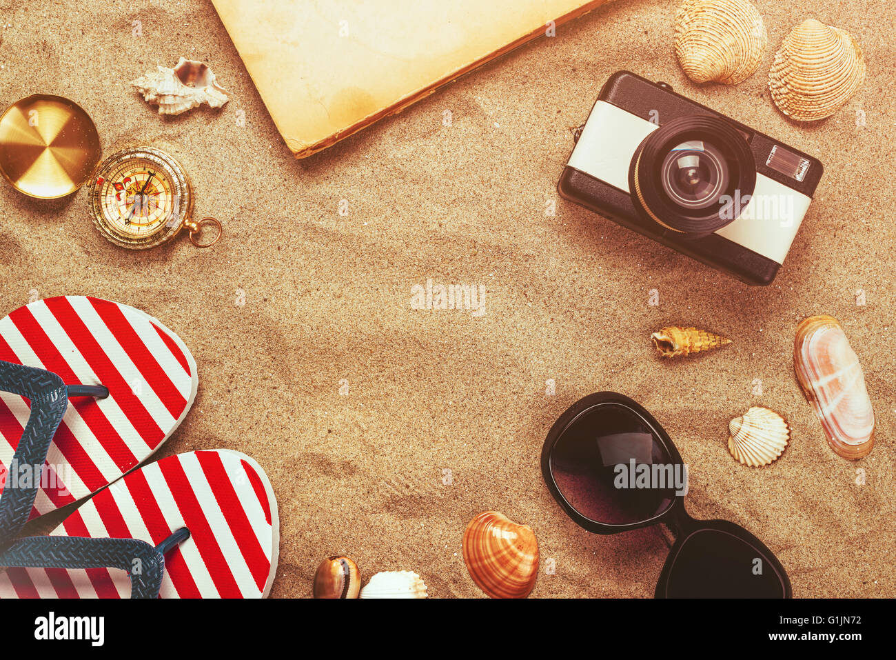 Beach ready, summer holiday vacation accessories on sandy beach ...