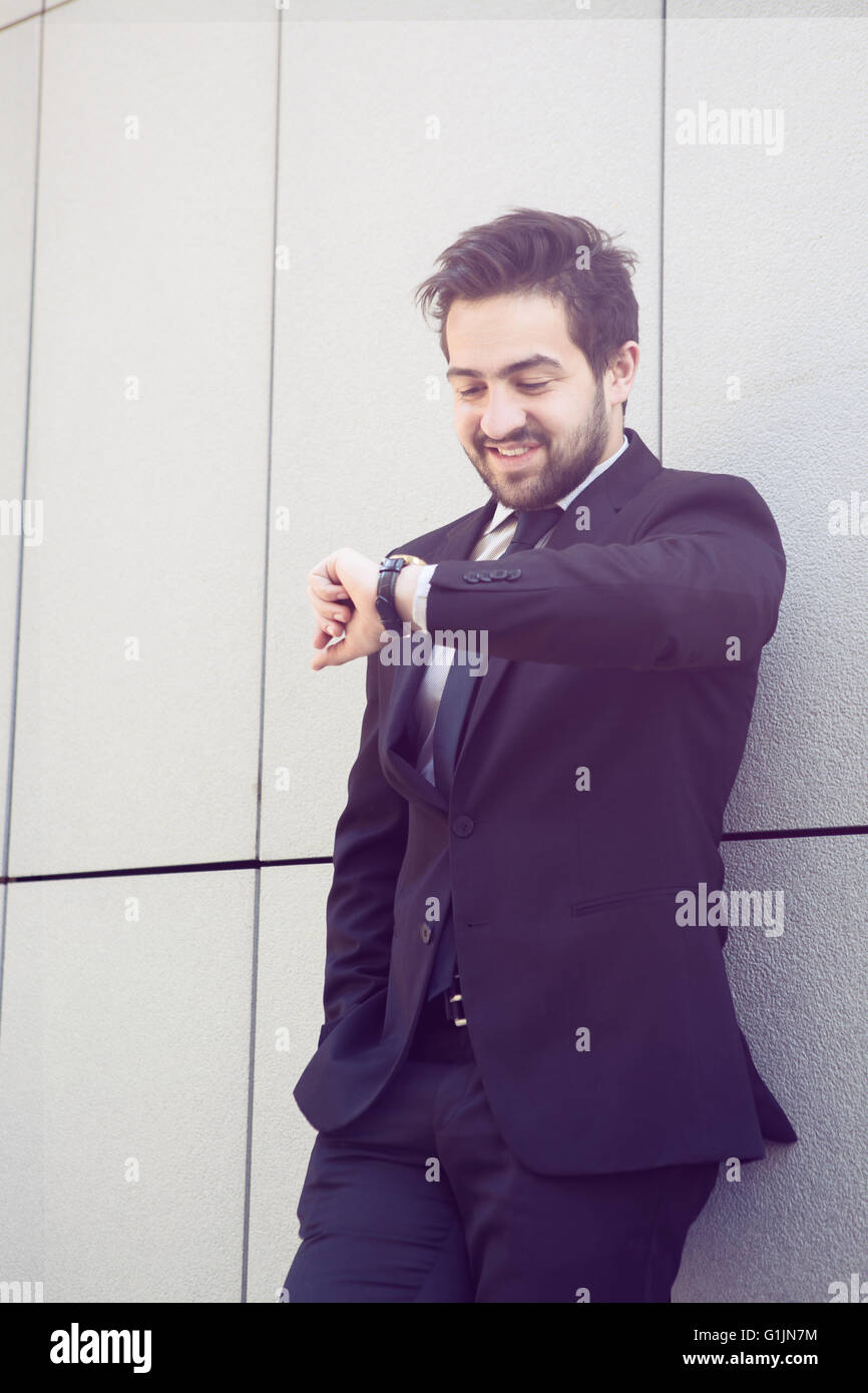 Portrait businessman waiting checking hi-res stock photography and ...