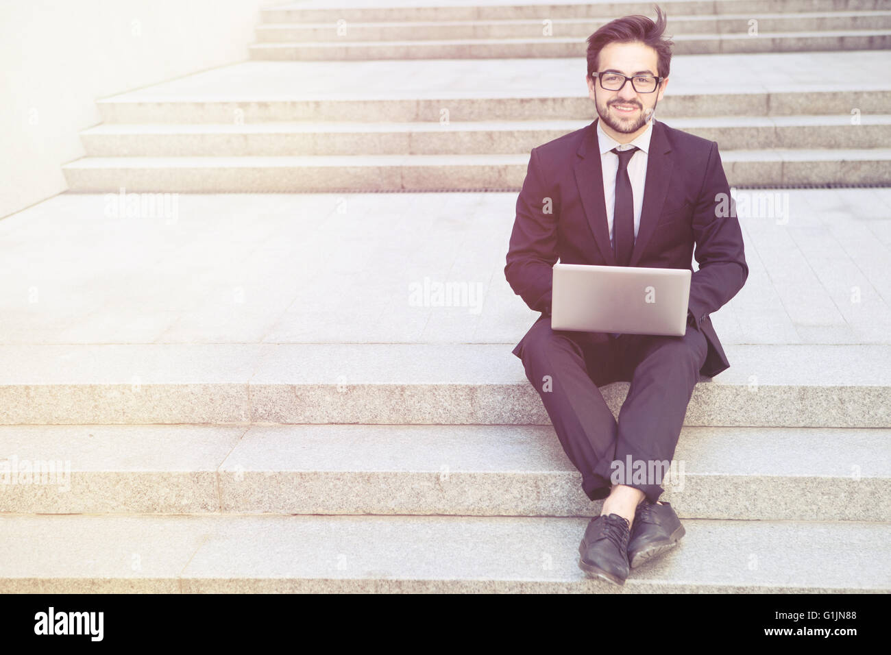 Professional man walking laptop computer hi-res stock photography and ...