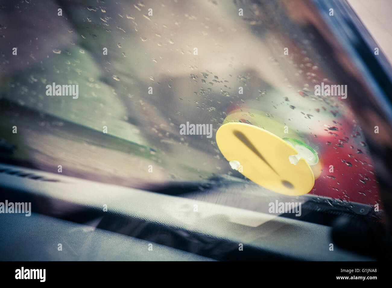 Color image of a beginner driver sign stuck on a car's windshield Stock ...