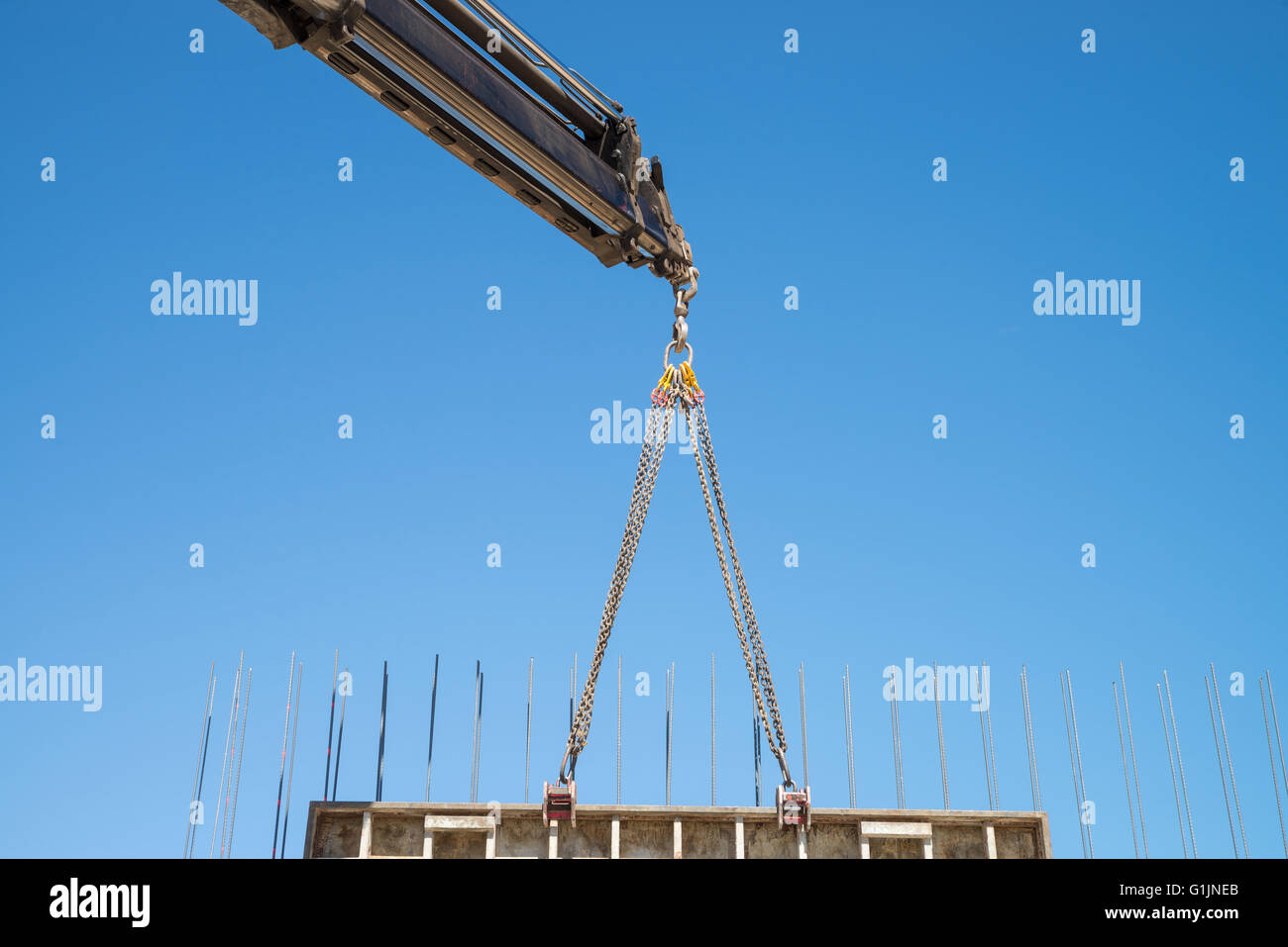 Crane removing a large formwork panel as used for concrete shuttering ...