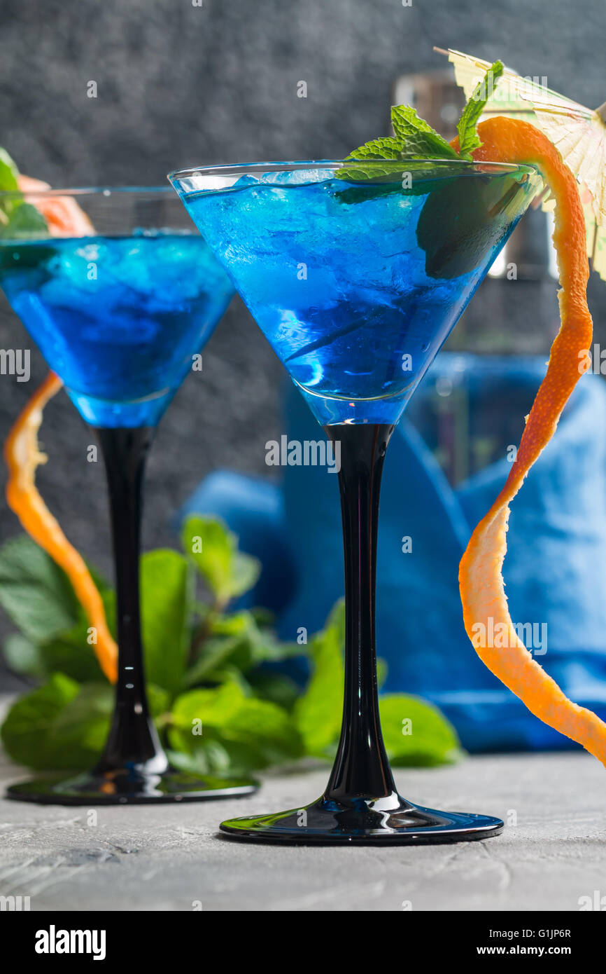 Blue cocktail with ice Stock Photo - Alamy