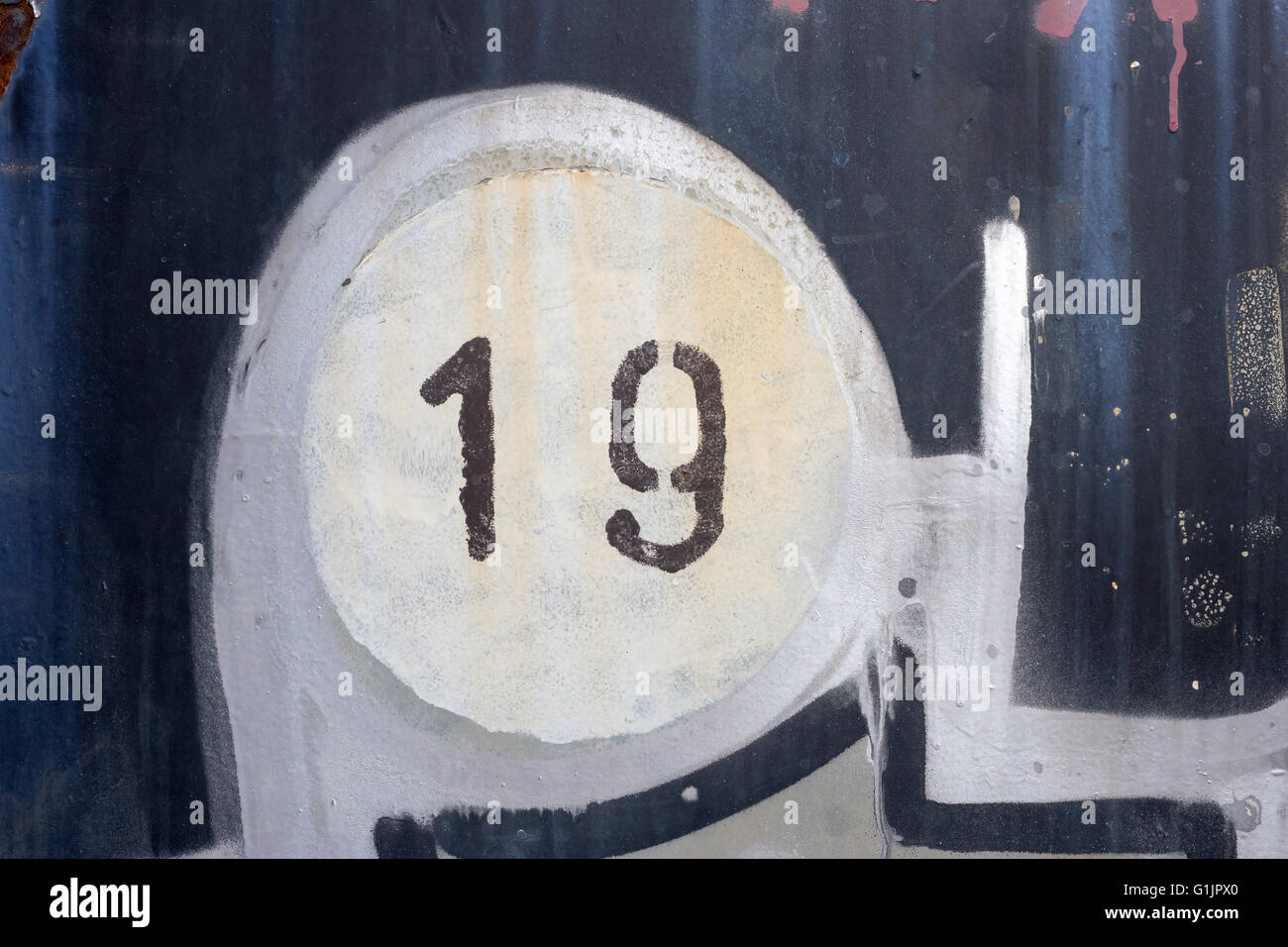 Number 19 on old painted and rusted metal panel Stock Photo - Alamy
