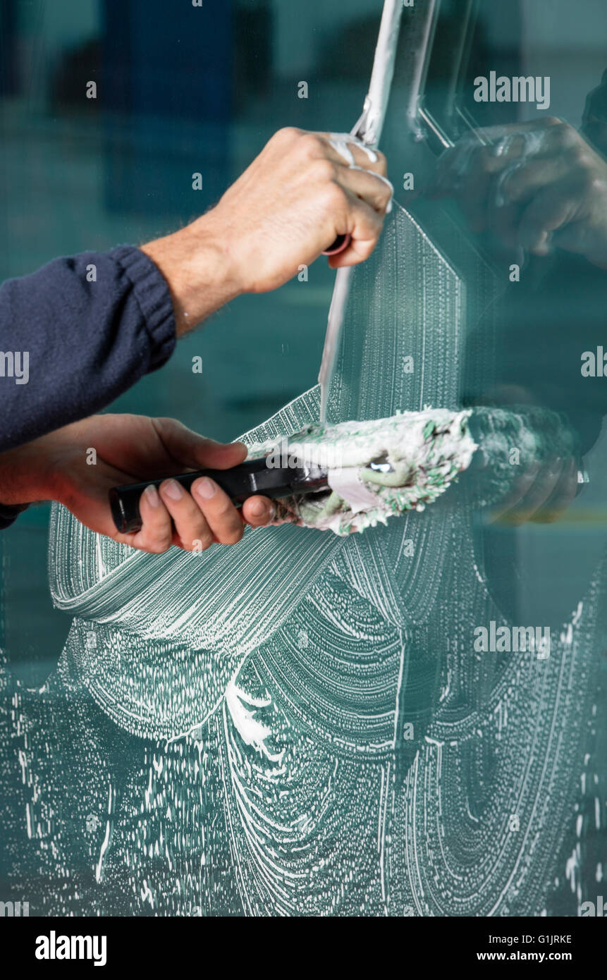 window cleaning with a squeegee Stock Photo - Alamy