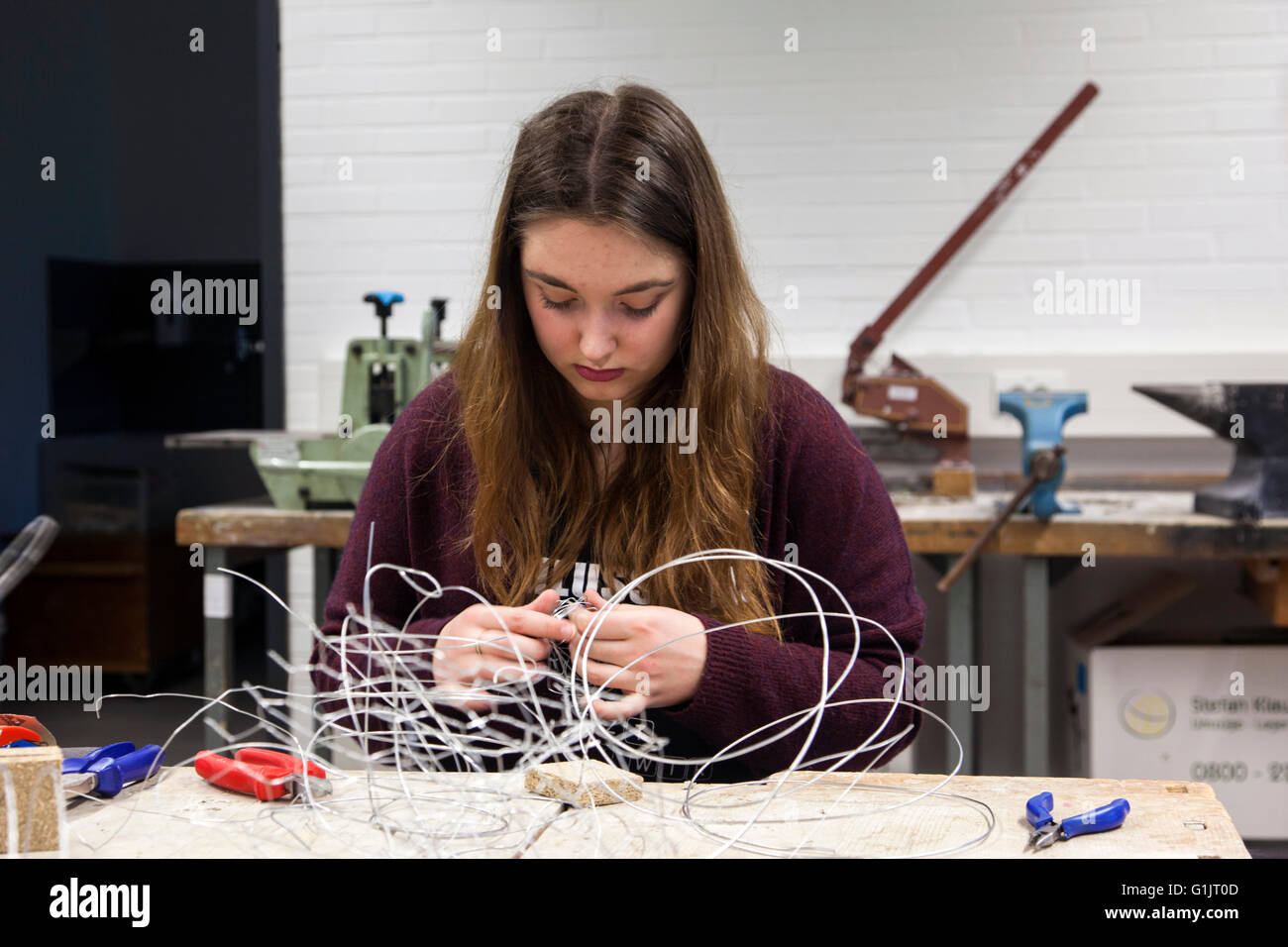 Student in art class create a work of art Stock Photo - Alamy