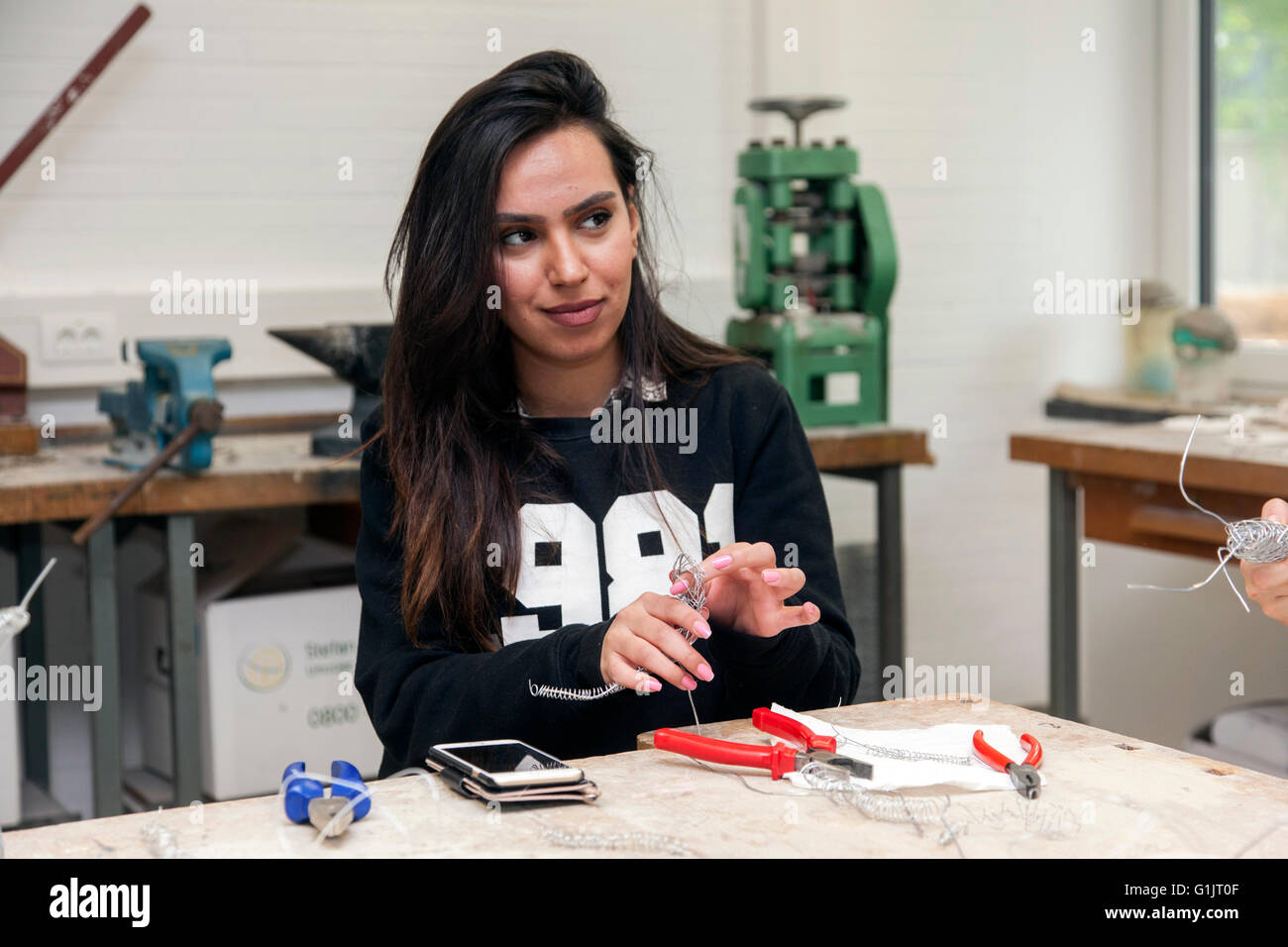 Student in art class create a work of art Stock Photo - Alamy