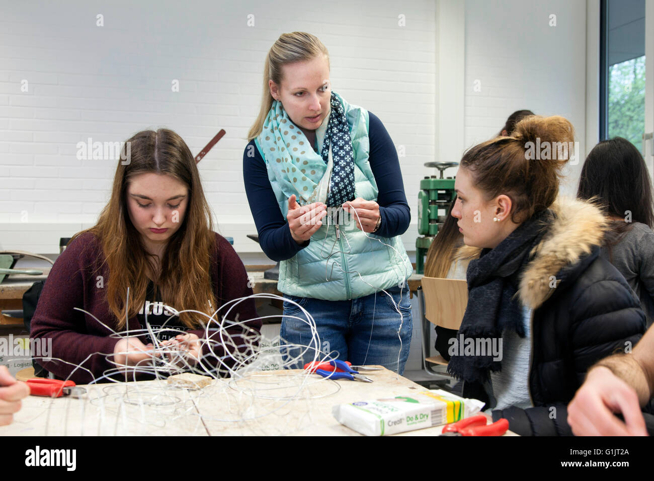 Students in art class create a work of art Stock Photo - Alamy