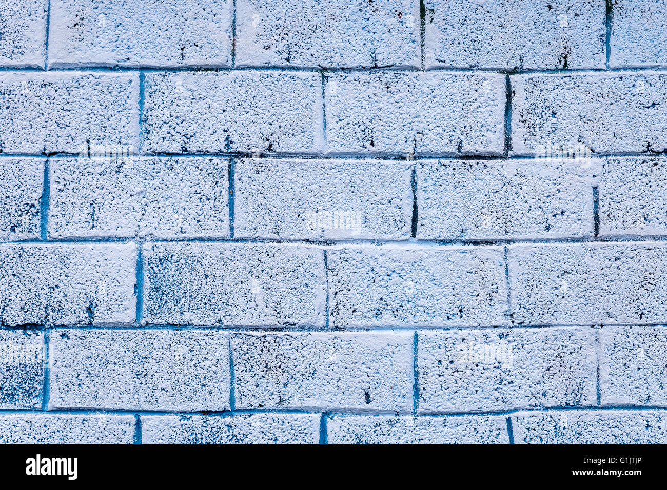 Background texture of a old blue brick wall Stock Photo - Alamy