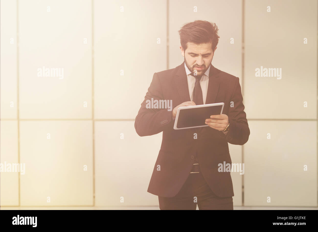 Walking with tablet hi-res stock photography and images - Alamy