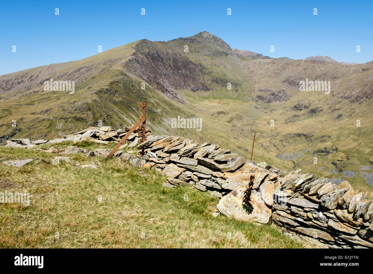 View from Yr Aran across drystone wall and Cwm Llan to Mount Snowdon ...