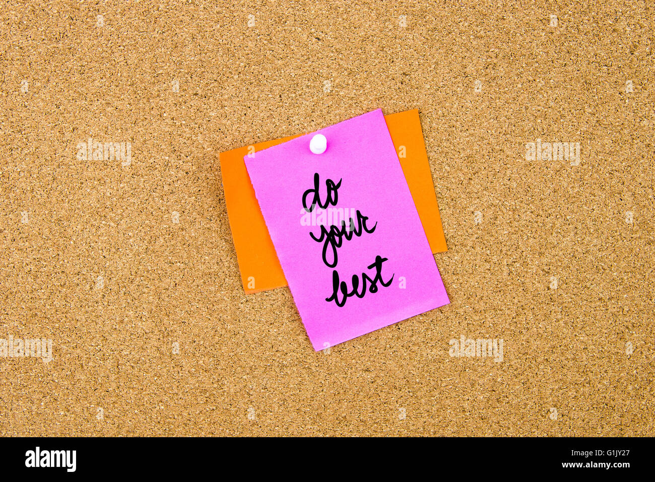 Do Your Best written on paper note pinned on cork board with white ...