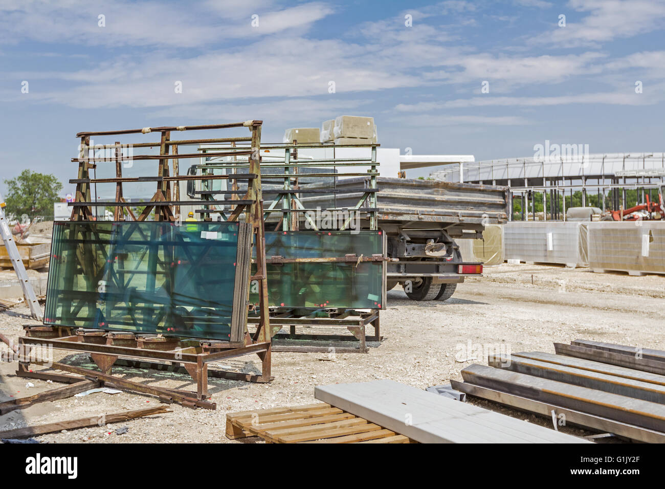 Pallet with Thermo window glasses in construction site waiting for ...
