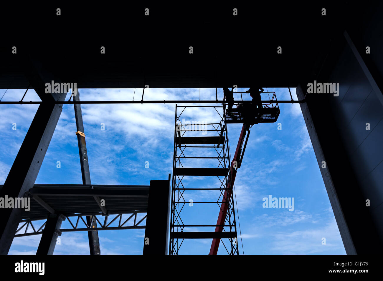 Construction workers in cherry picker hi-res stock photography and ...
