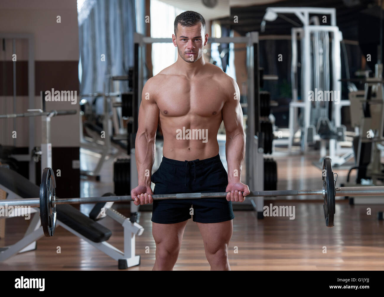 Muscular male bodybuilder in gym hi-res stock photography and images ...