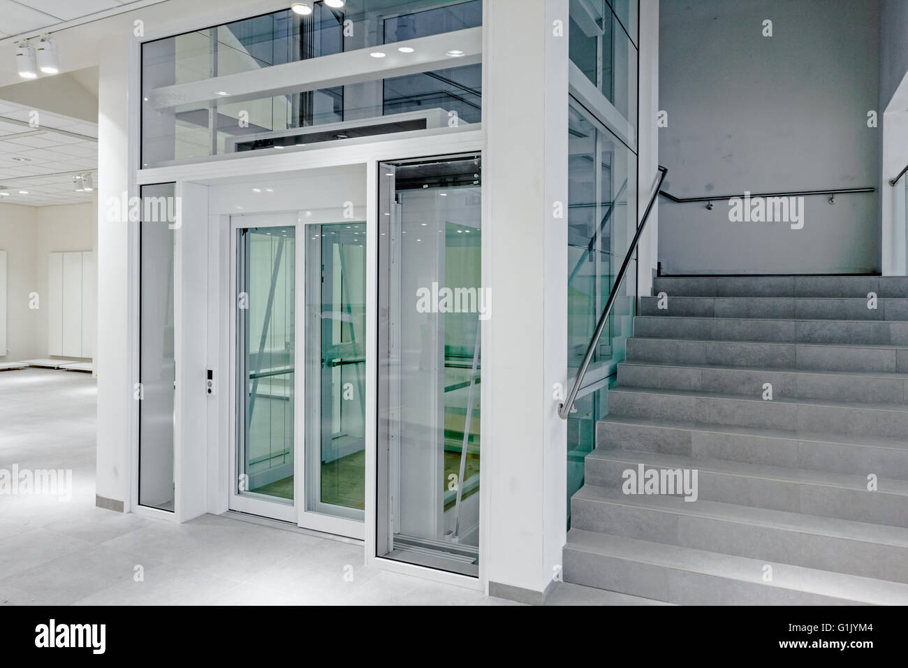 Staircase and elevator in a business centre, shopping mall Stock Photo ...