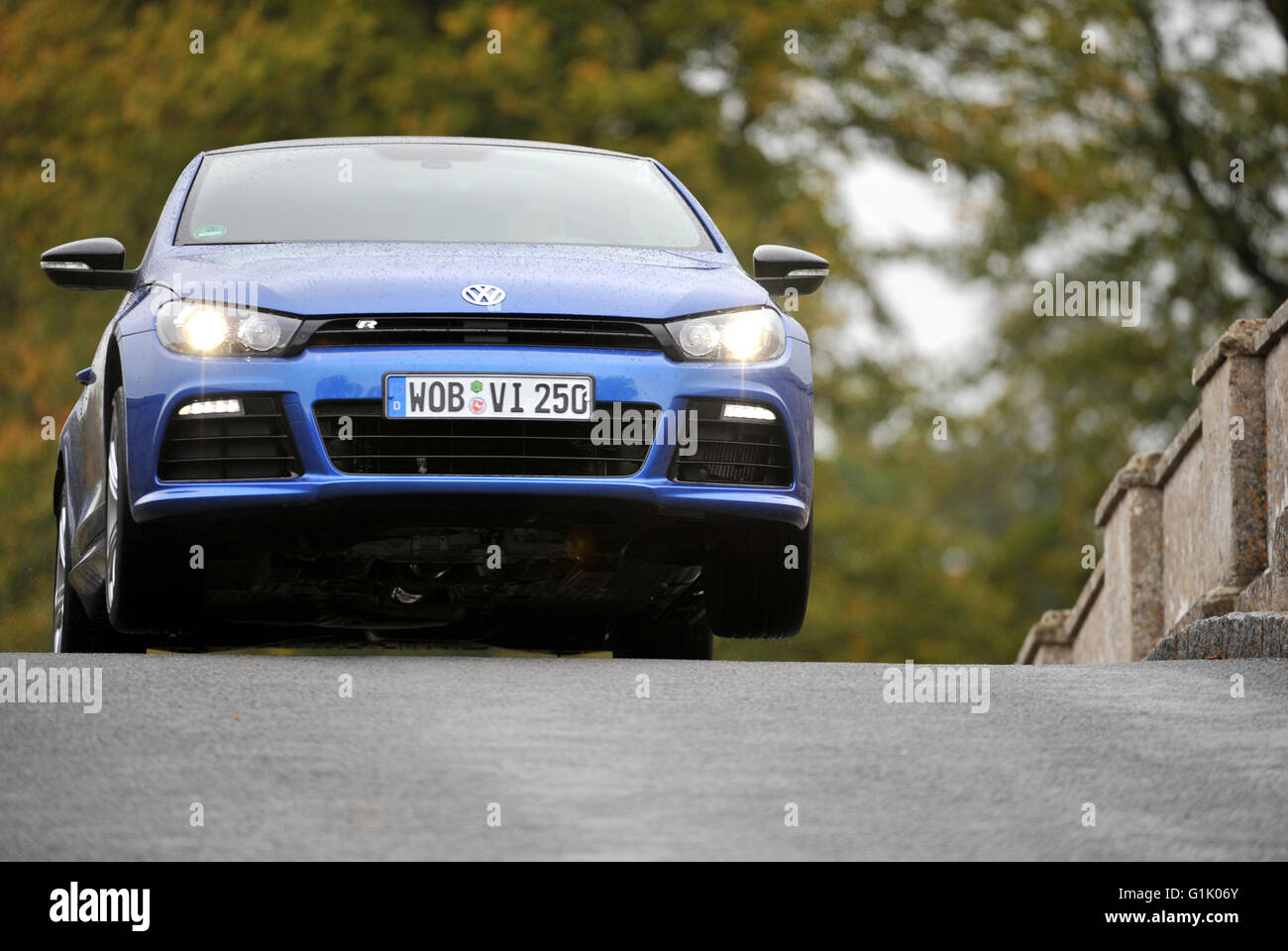 Car jumping a bridge - VW Scirocco R Stock Photo - Alamy