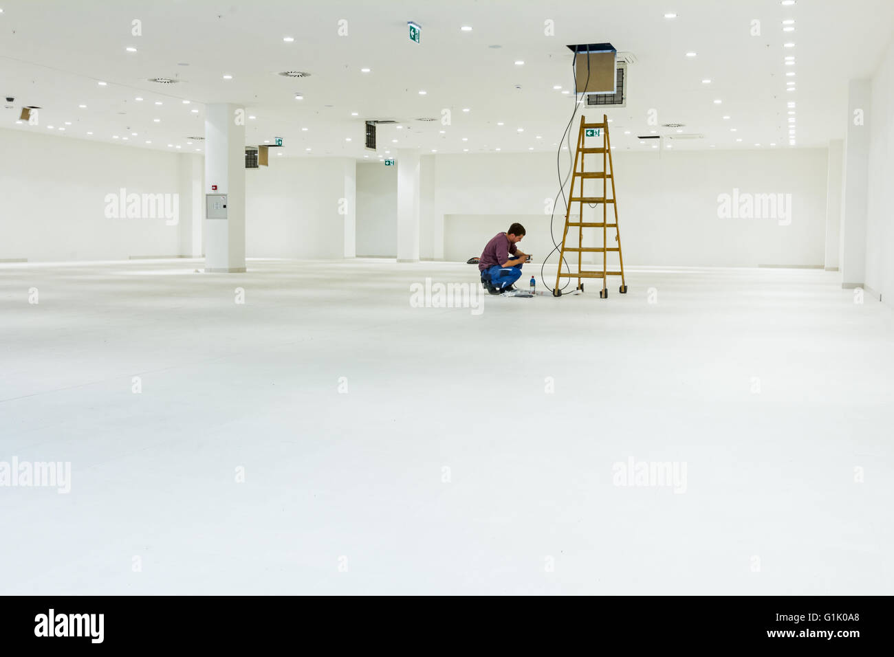 Workers are used wooden ladder to complete conditioning system ...