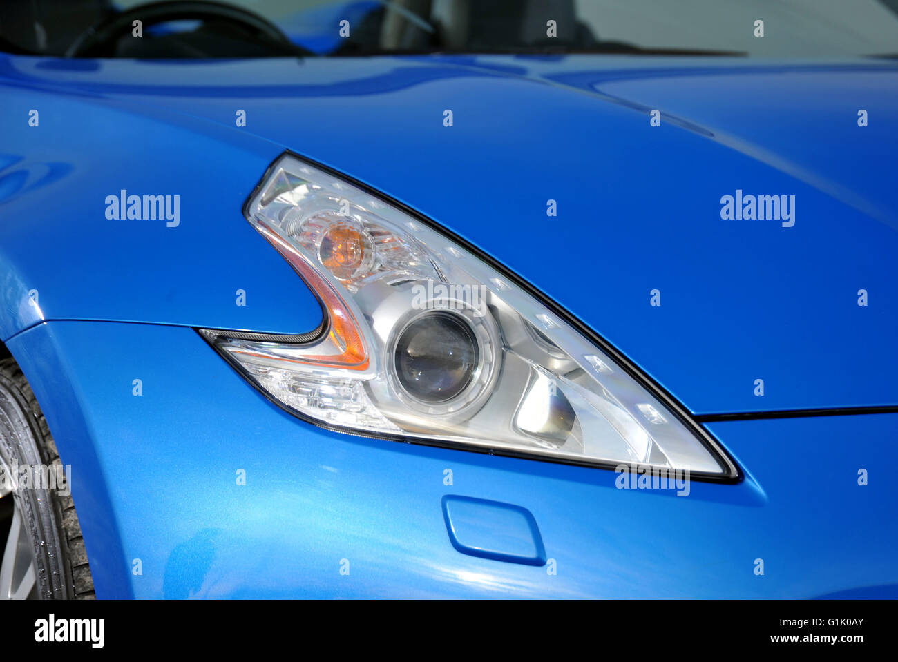Nissan 370Z convertible Japanese sports car headlight Stock Photo - Alamy