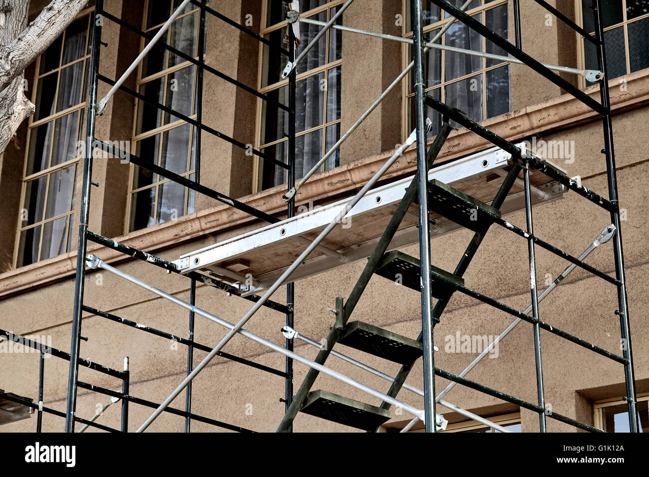 Scaffolding set up on building for renovations, repair and painting ...