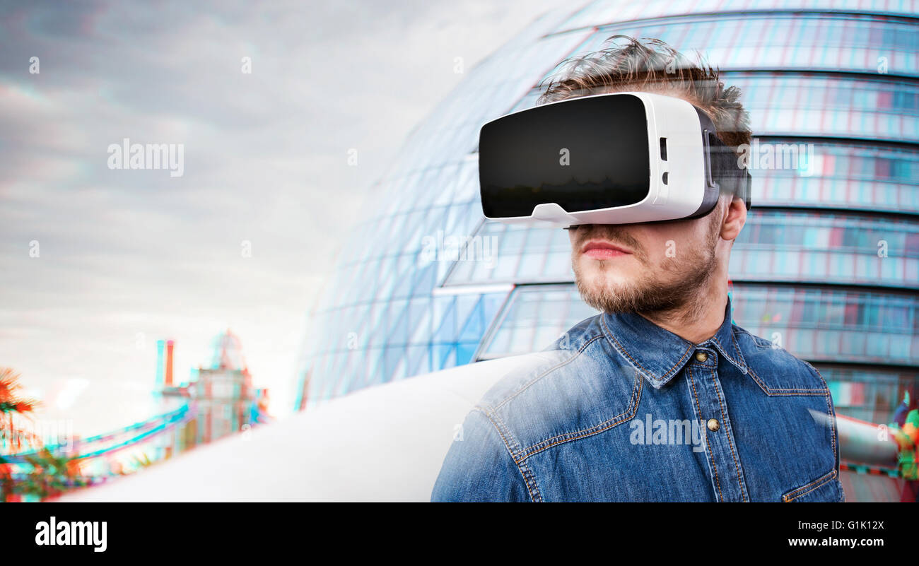 Man wearing virtual reality goggles. London, England Stock Photo - Alamy