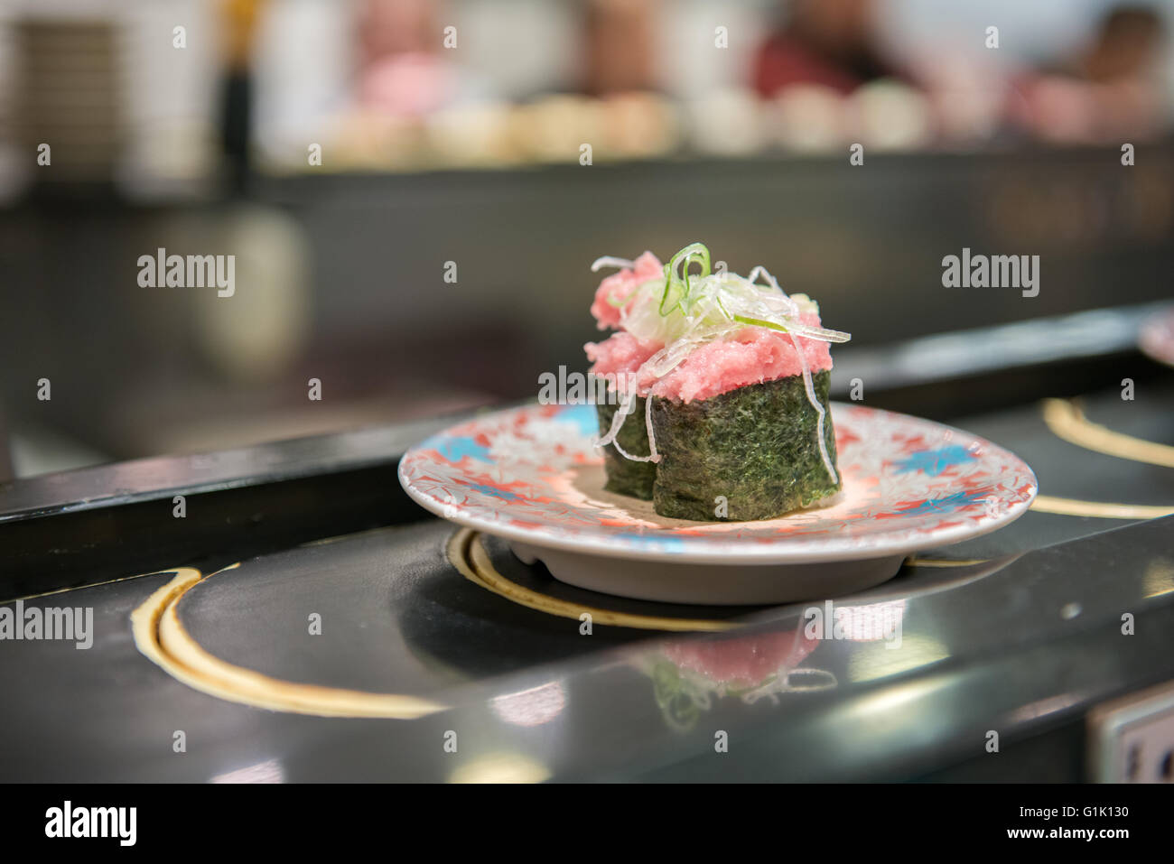 Japanese food parcel sushi on rotational belt Stock Photo - Alamy
