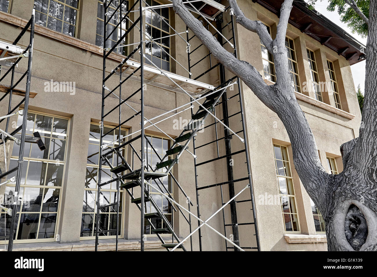 Scaffolding set up on building for renovations, repair and painting ...
