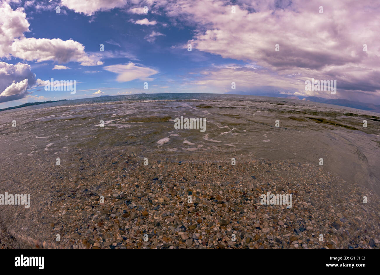 pebbles on beach on the Greek island of Corfu Stock Photo - Alamy