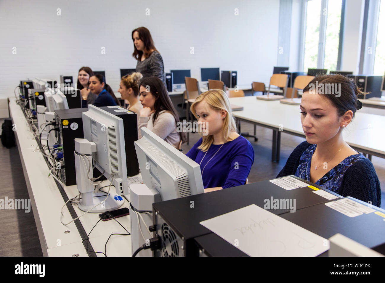 Students working at computer workstation hi-res stock photography and ...