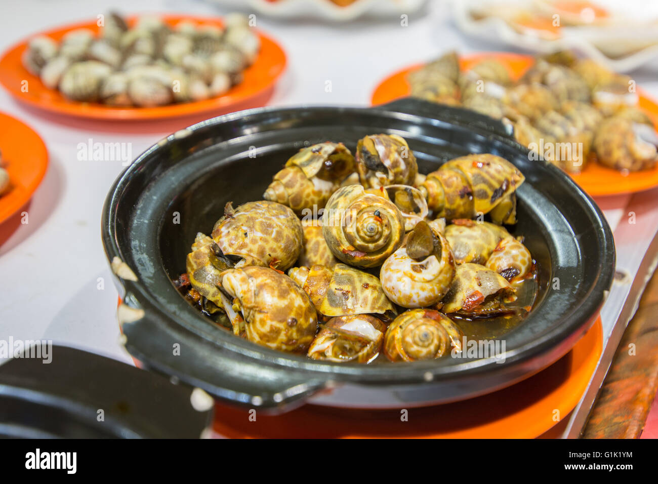 Snail seafood hi-res stock photography and images - Alamy